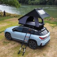 China Outdoor self driving camping roof tent with large black glue aluminum shell triangular roof tent inside for sale