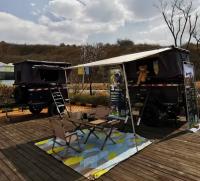 China New Small Off-Road Trailer for Self-Driving Camping Trips Wilderness RV Tent House with Car Application and Shock Absorber for sale