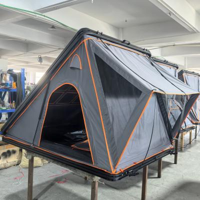 China Aluminum Hard Shell Rooftop Tent Foldable Outdoor Camping Car Off Road 4x4 Self Driving Triangular 5 Person Car Roof Top Tent for sale