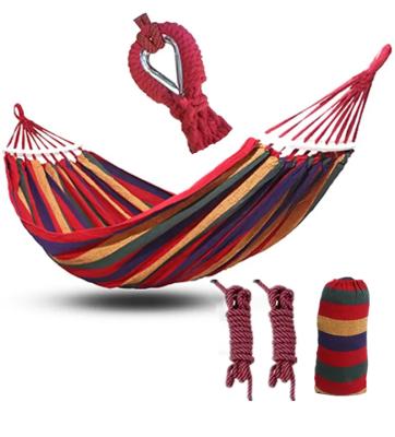 China Modern Rainbow Durable Outdoor Brazilian Nylon Travel Hammocks Beach Swing Bed Hardwood Spreader Bar Suspended Outdoor Furniture for sale