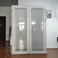 China CE Certified Aluminum Hinged Doors with 2.0mm Profile Thickness and 5mm+12A+5mm Double Tempered Glass for sale