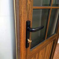 China Custom Aluminum Hinged Doors with 5mm Glass and 2.0mm Profile - Wood Grain Color Exterior Doors for sale