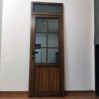 China Custom Aluminum Hinged Doors with 5mm Glass and 2.0mm Profile - Wood Grain Color Exterior Doors for sale