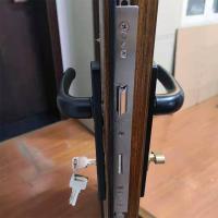 China Custom Aluminum Hinged Doors with 5mm Glass and 2.0mm Profile - Wood Grain Color Exterior Doors for sale
