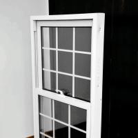 China PVC Double Hung Windows with 1.5mm Steel Lining and Double Glazed Glass Options for Weather Resistant Performance for sale