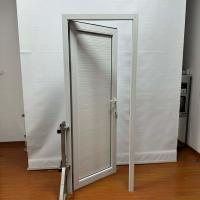 China 2.5mm PVC Hinged Door with Double Tempered Glass - Weather Resistant Modern Design for Residential and Commercial Buildings for sale