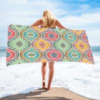 China Custom Polyester Beach Towel 140x70cm Quick Dry Sunscreen Blanket for Women for sale