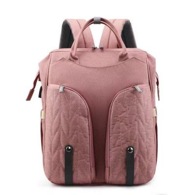 China 600D Polyester Mommy Diaper Bag with Crib Large Capacity 25x35x15cm Travel Bag for sale