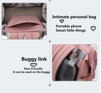 China 600D Polyester Mommy Diaper Bag with Crib Large Capacity 25x35x15cm Travel Bag for sale