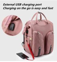 China 600D Polyester Mommy Diaper Bag with Crib Large Capacity 25x35x15cm Travel Bag for sale