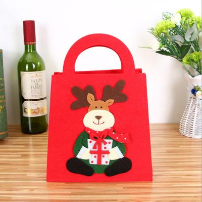 China Christmas Felt Gift Handbag 20x28 cm Custom Logo Durable Non-Woven Santa Bag for sale