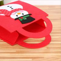 China Christmas Felt Gift Handbag 20x28 cm Custom Logo Durable Non-Woven Santa Bag for sale
