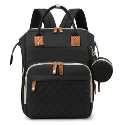 China Multi Function Mommy Diaper Backpack With Changing Bed Infant Baby Diaper Bag for sale