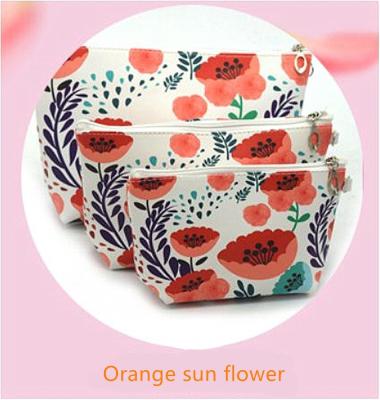 China Waterproof PU Leather Cosmetic Bag Large Capacity 11x5.5x8.5 Inch Orange Sunflower for sale