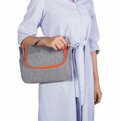 China Water Resistant Fabric Durable Waterproof Hanging Toiletry Bag With Handle for sale