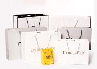 China Custom White Paper Gift Bags with Handles Folding Shopping Bags 2000 Pcs MOQ Kraft Material for sale