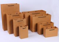 China Custom Kraft Paper Gift Bags with Handles 2000pcs MOQ Eco Friendly Durable Shopping Bags for sale