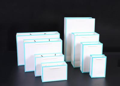 China Custom White Paper Gift Bags with Handles for Christmas 2000 pcs MOQ for sale