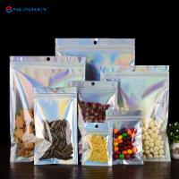 China Food Waterproof Moisture Proof Mylar Bags Custom With Zipper Holographic Packaging Bag for sale