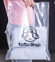 China PE Shopping Single Layer Laminated Packaging Bags Transparent Plastic Bag With Handle for sale