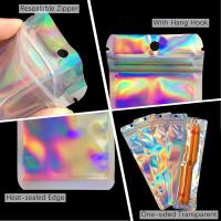 China Gift Cosmetic Packaging Bag Smell Proof Holographic Clear Cosmetic Brush Pen Mylar for sale