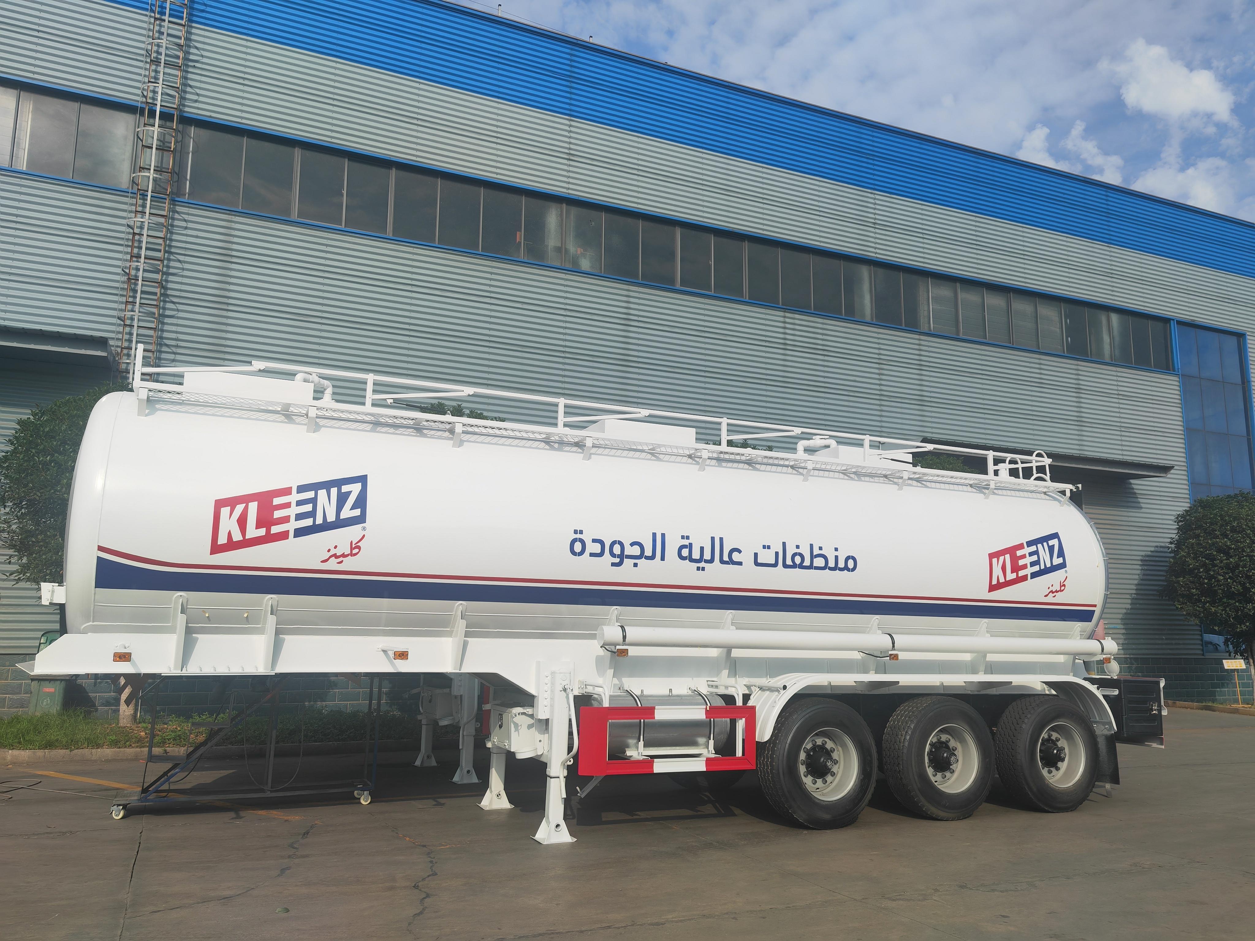 Side profile of 3 axle high quality liquid detergent transport semi-trailer with custom Arabic branding and KLEENZ logo for Saudi Arabia and Iraq markets