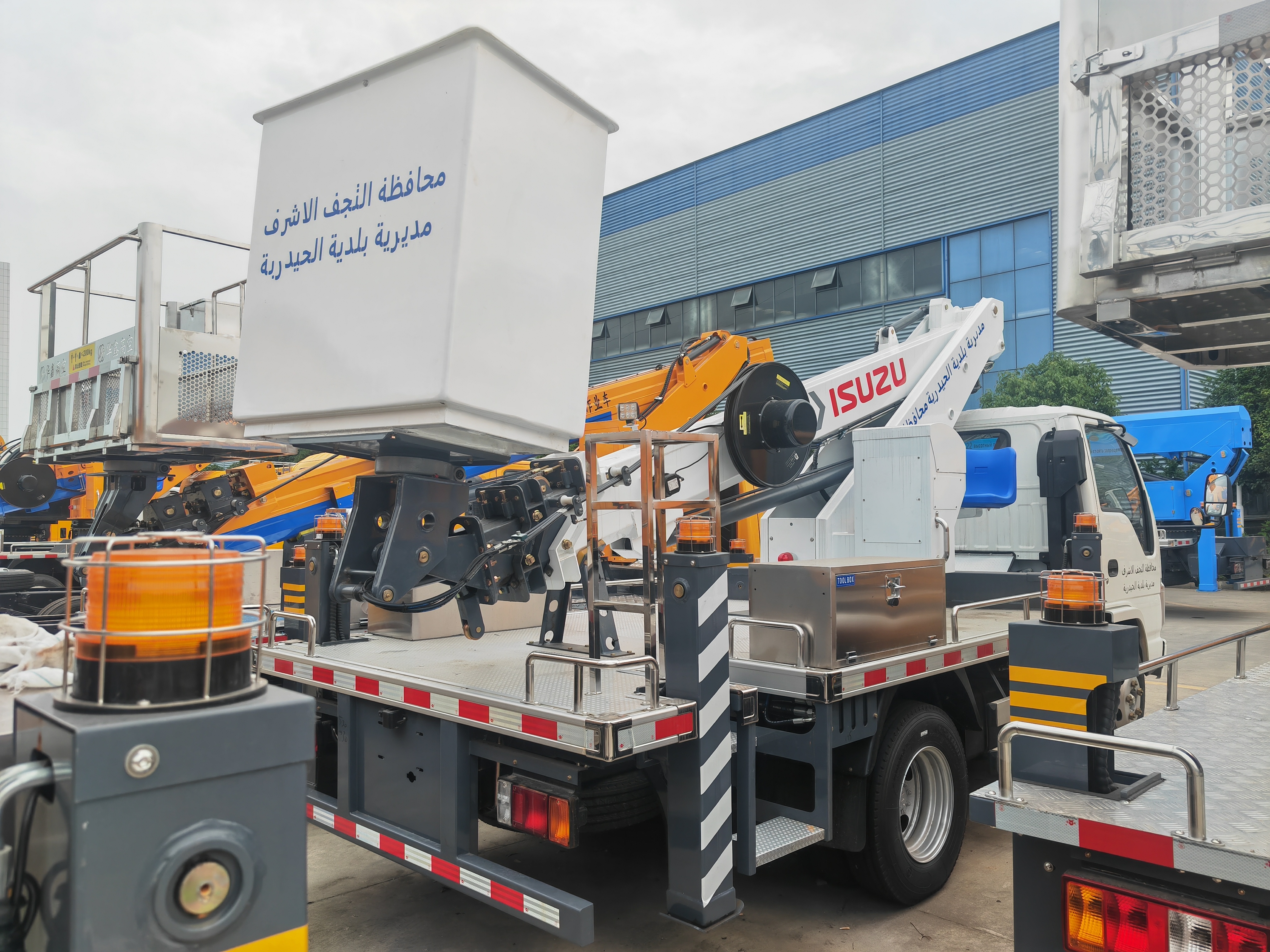 Custom Arabic branding on ISUZU bucket truck for Najaf municipality