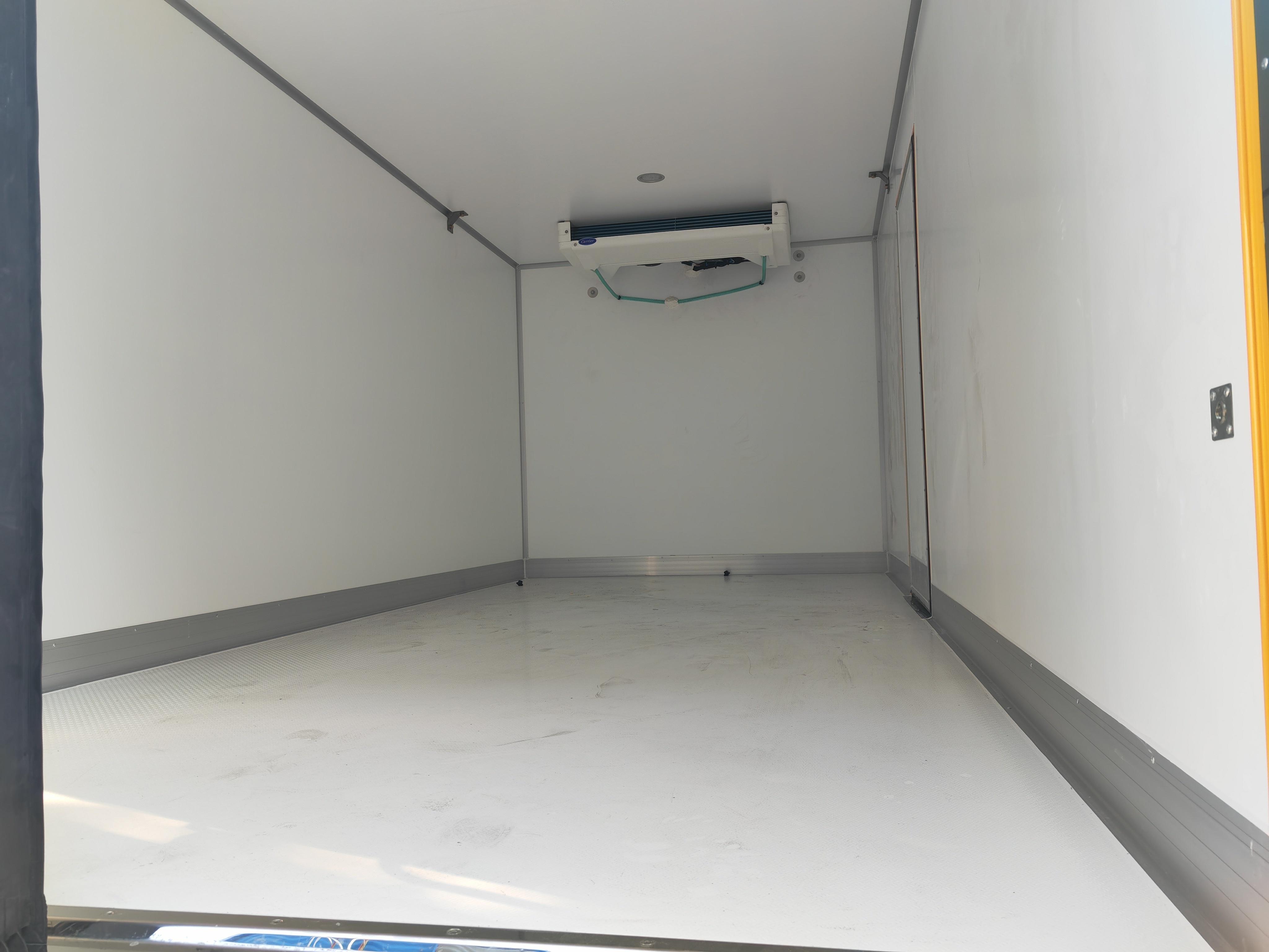 Inside view of fiberglass insulated box truck with Carrier evaporator and aluminum floor