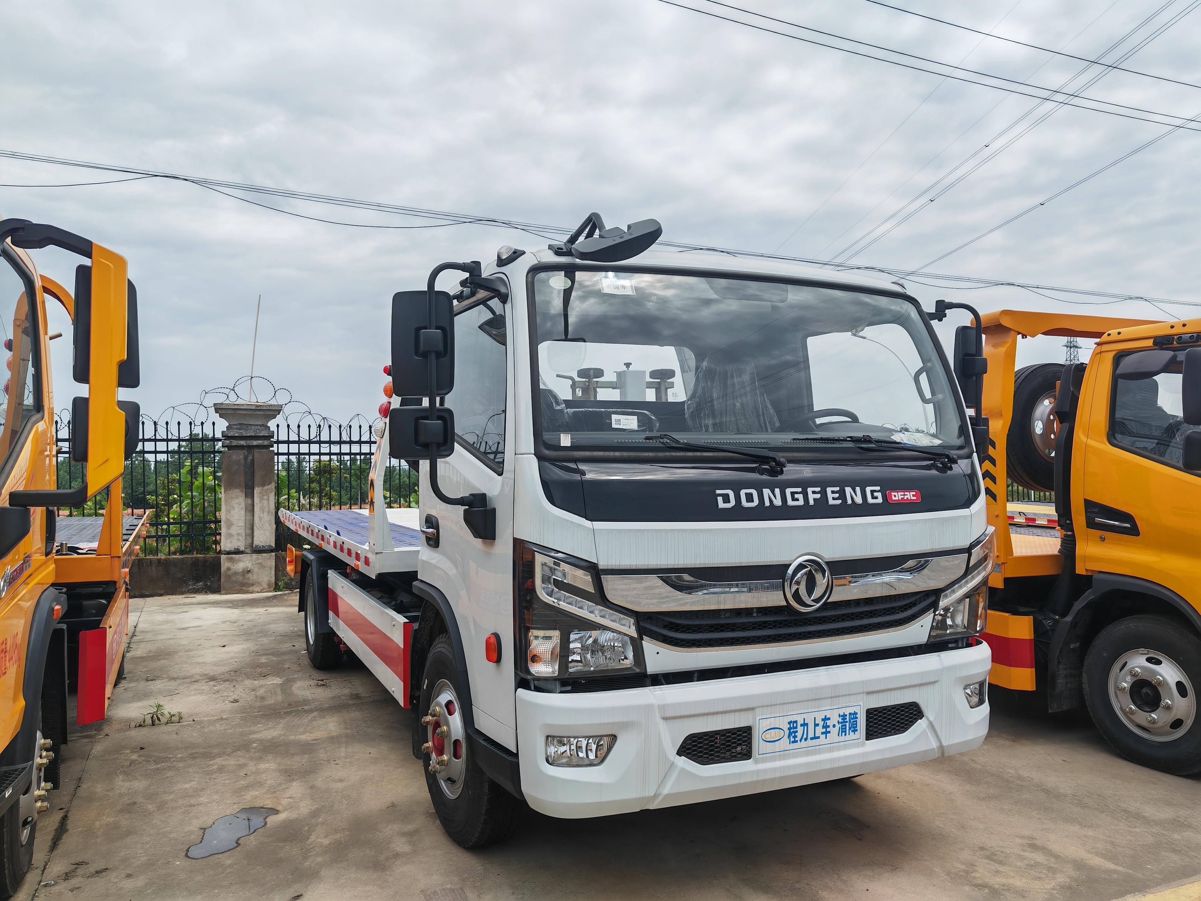 Dongfeng flatbed tow truck with white cabin manufactured by CLW Group for export to Venezuela