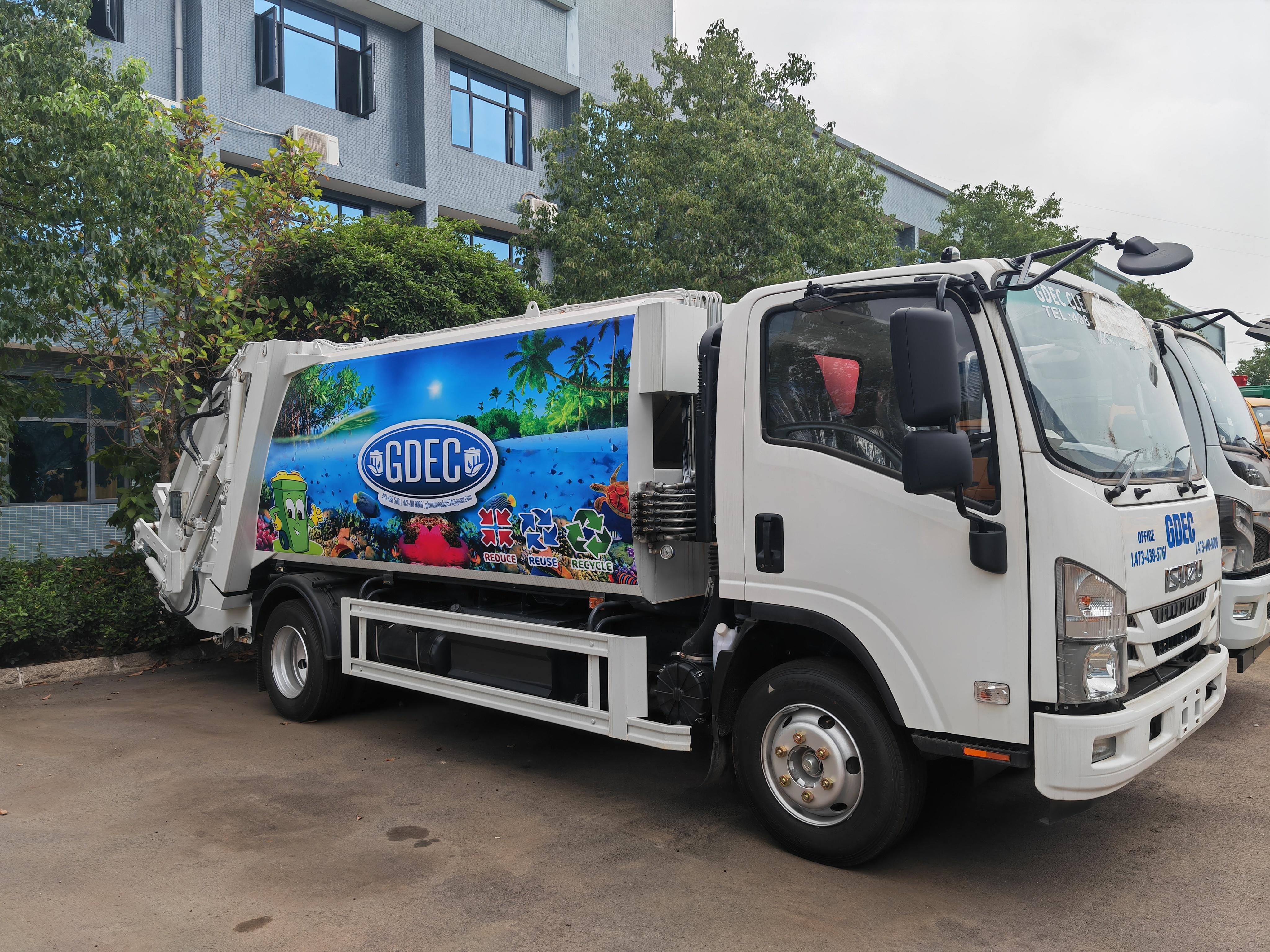 ISUZU rear loader waste compactor truck for Grenada GDEC project by Chengli Special Automobile Co., Ltd