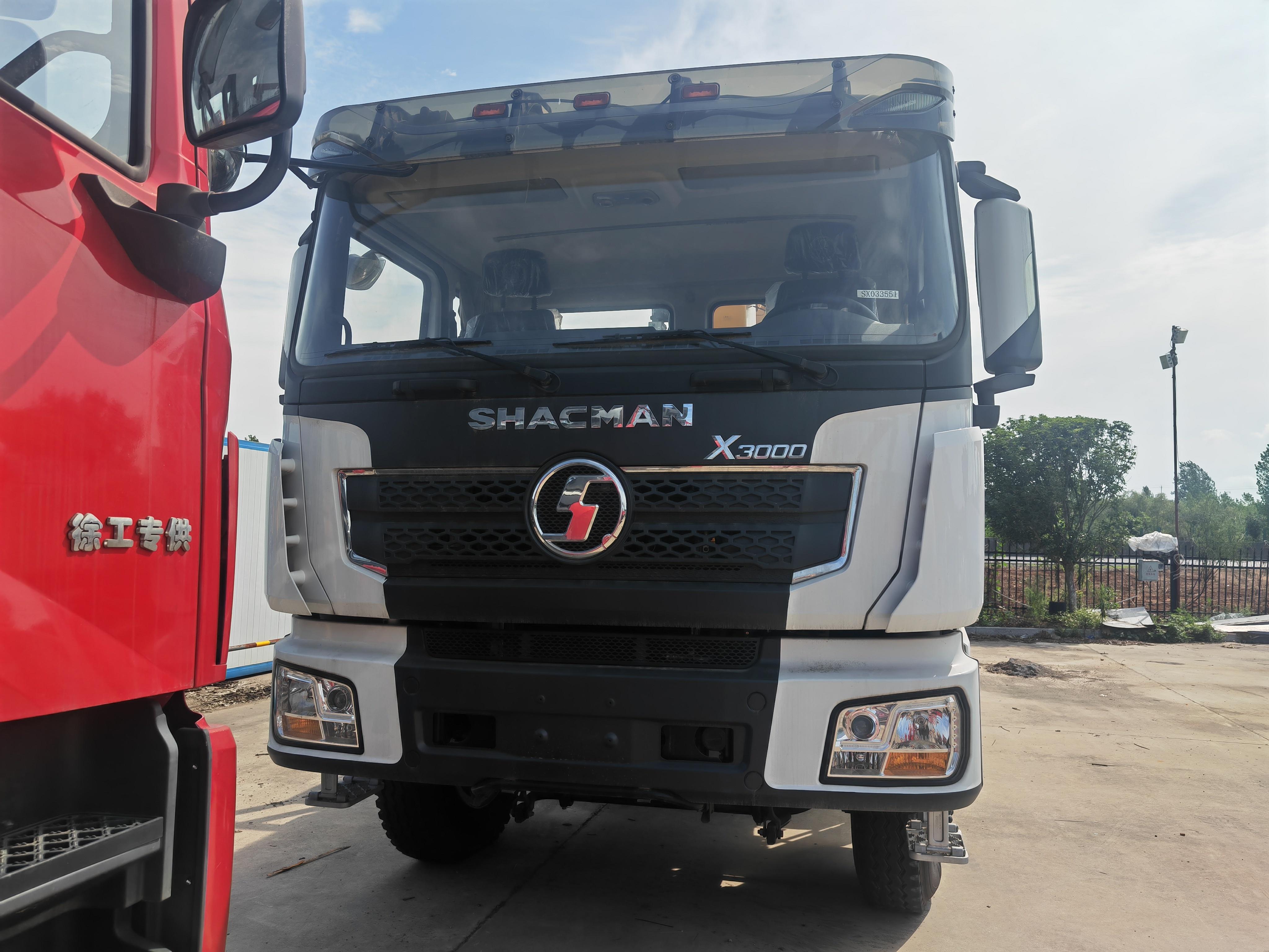 Front view of Shacman X3000 heavy duty crane truck chassis