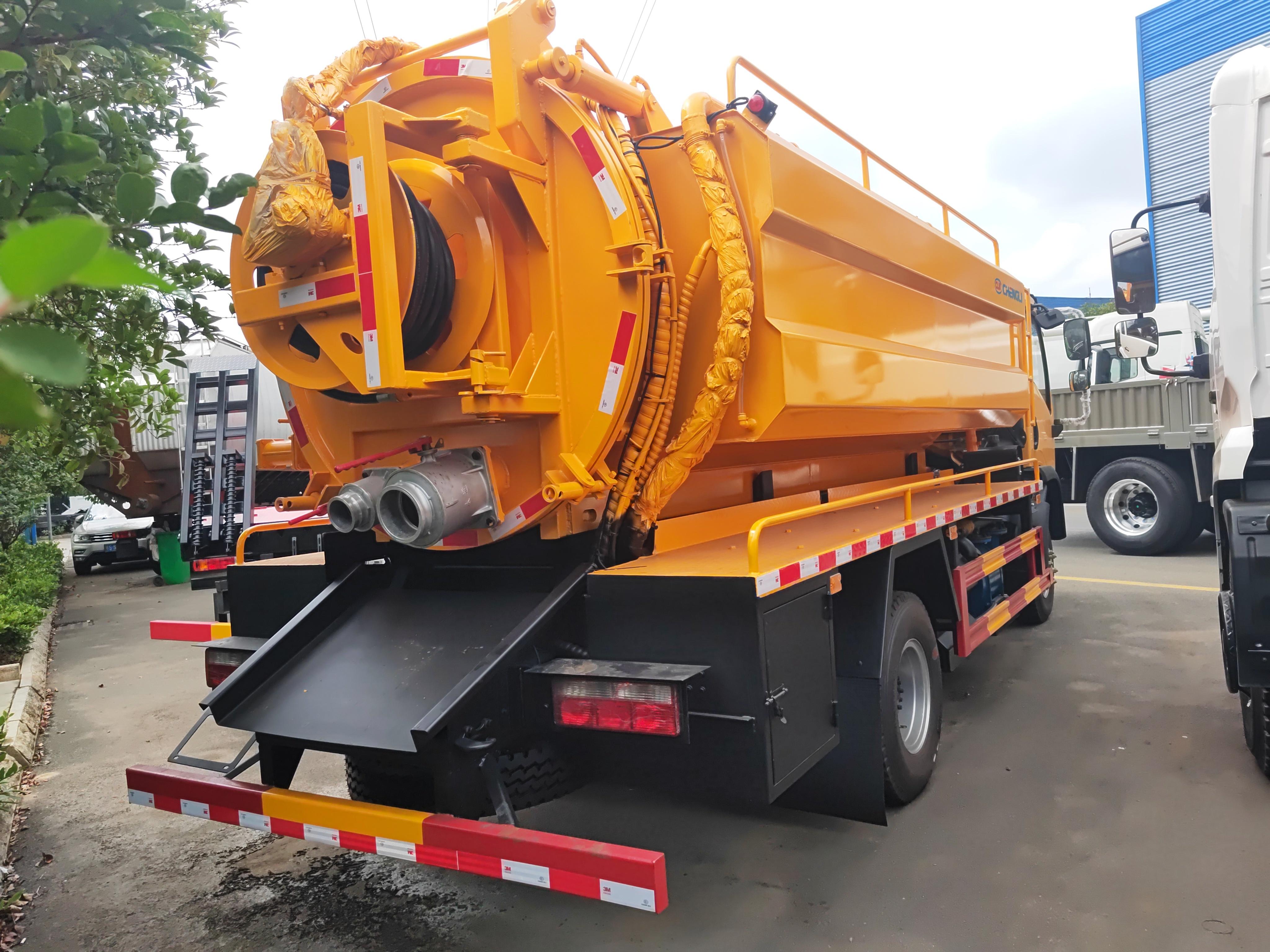 Rear view of CLW sewer jetting and suction truck with hose reel and discharge door