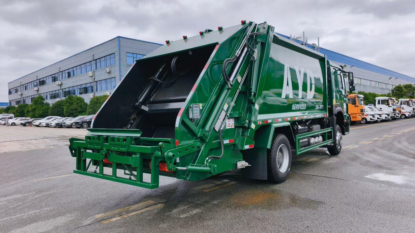 Heavy duty HOWO 15cbm refuse compactor truck exported to Saipan CNMI
