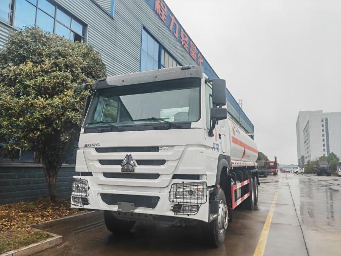 Front view of SINOTRUK HOWO 371HP 3 axle 20cbm fuel tanker truck with headlight protection grills