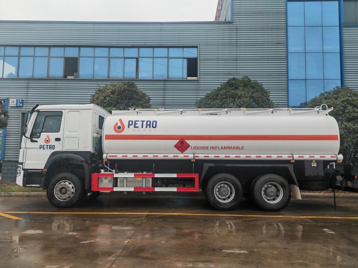 Side profile of HOWO 20000 liters fuel tanker truck printed with Petro Energy logo and Liquide Inflammable text