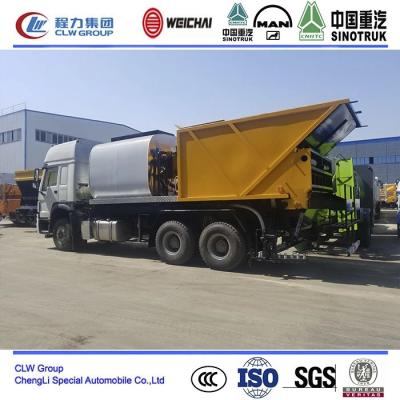 China HOWO Construction Asphalt Rubber Chip Sealer Macadam Gravel Synchronous Truck for sale