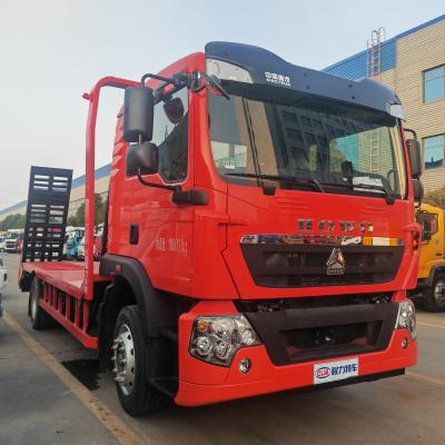 China HOWO Flatbed Excavator Mixer Transport Heavy Engineering Equipment Machinery Truck With Climbing Ladder for sale