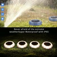 China Solar Disk Light 4pack with IP68 Waterproof, 6-8 Hours Working Time, and Warm White Light for Outdoor Spaces for sale