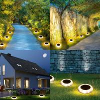 China Solar Disk Light 4pack with IP68 Waterproof, 6-8 Hours Working Time, and Warm White Light for Outdoor Spaces for sale