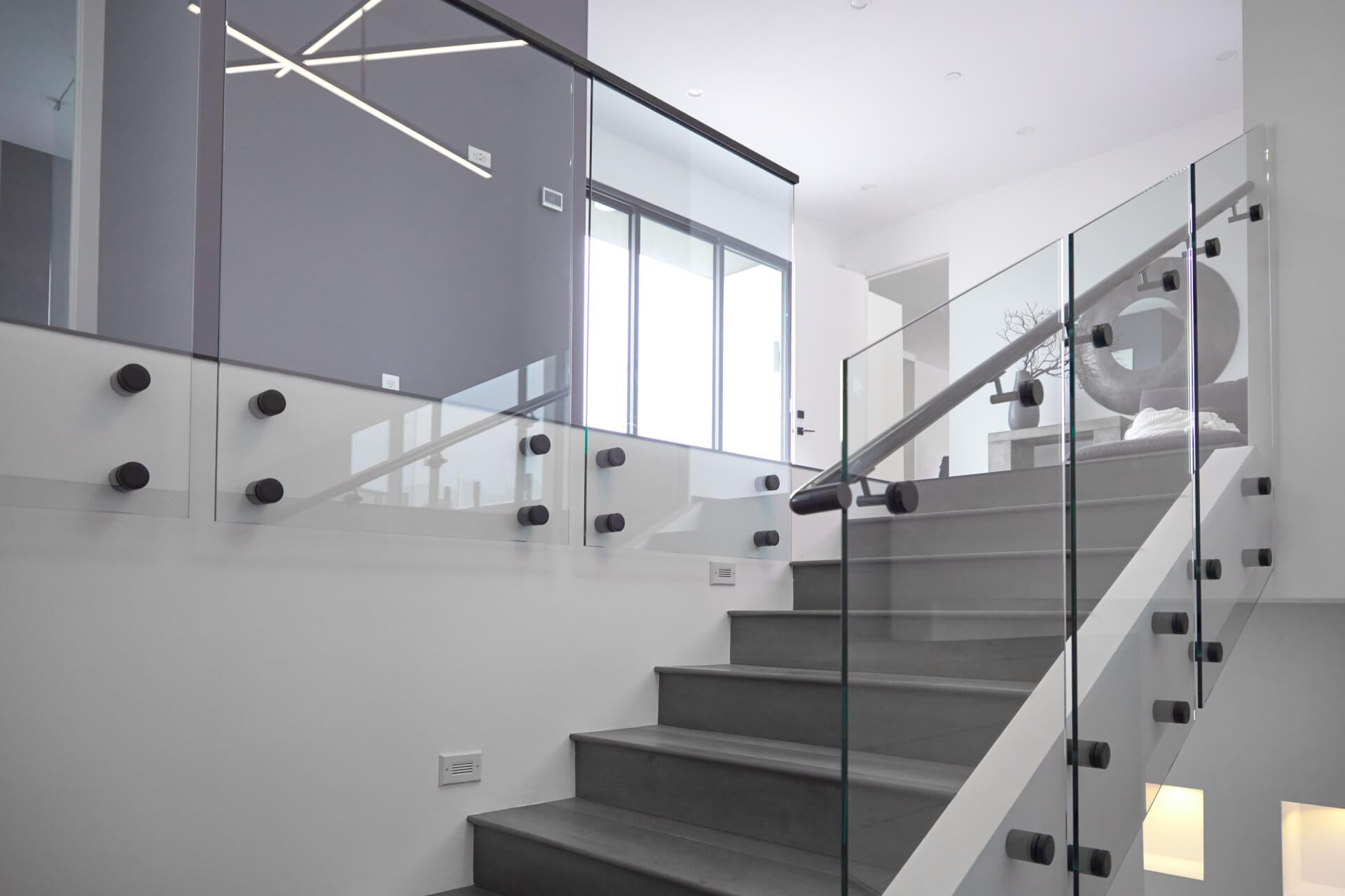 A Variety of Glass Railing in a Black Finish - Viewrail
