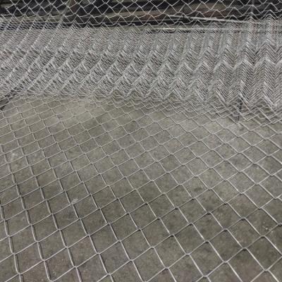 China 1.8m Height Chain Mesh Security Fencing with Round Posts - Galvanized Steel Construction for Perimeter Protection for sale