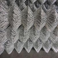 China 1.8m Height Chain Mesh Security Fencing with Round Posts - Galvanized Steel Construction for Perimeter Protection for sale
