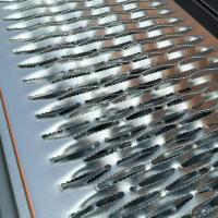 China Serrated Steel Grating 50mm 100mm Bar Spacing Welded Pressure Locked Industrial Flooring for sale