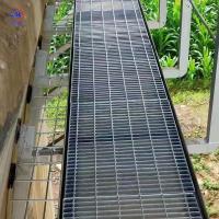China Hot Dip Galvanized Steel Grating 3-10mm Thickness Anti Slip Serrated Edge Industrial Flooring for sale