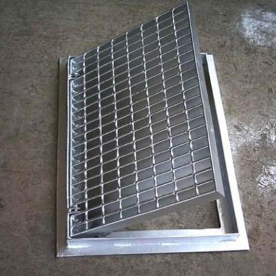 China 3mm Serrated Grating Trench Cover with Angle Frame 25x5mm Bearing Bar Hot Dip Galvanized for sale