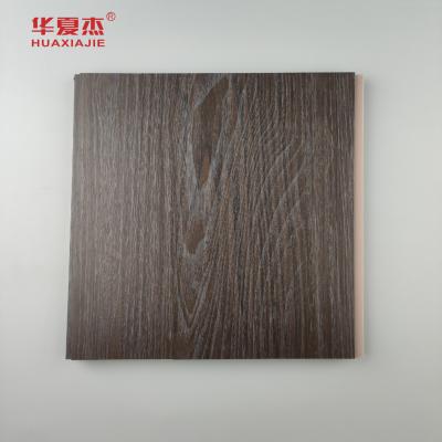 China Wholesale Dark Wood Grain Pvc Wall Panel Moisture Proof Pvc Ceiling Panel Office Decoration for sale