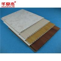 China Waterproof Strip PVC Ceiling Panels wooden grain PVC wall panel For Residential 1.5kg/sqm for sale