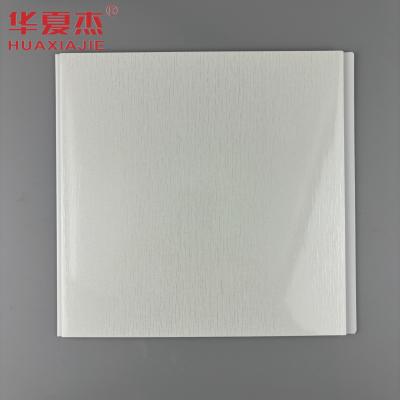 China White Baseplate With Silver Metallic Pattern Pvc Wall Panel Ceiling Decor Pvc Panels For Apartment for sale