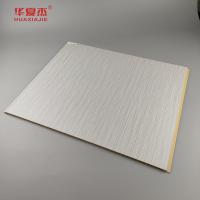 China Indoor Wall Decoration Livingroom Wpc Wall Panel In 600x9mm Laminated Wood Grain for sale