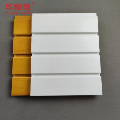 China Effortless Taupe And Wood Grain PVC Slatwall Panels For Craft Room Storage Solutions for sale